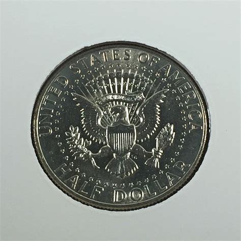 1965 P Kennedy Silver Half Dollar And 2 Stampsencased In 9 X 10 Story