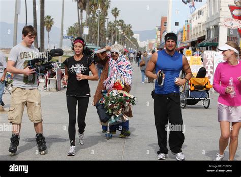Katie Price Aka Jordan Peter Andre And A Friend Being Filmed Completing A Mile Run From