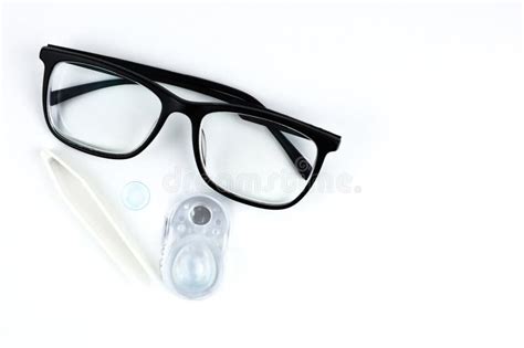 On The Left Of The Photo There Are Close Ups Of Black Framed Glasses Behind Them Disposable