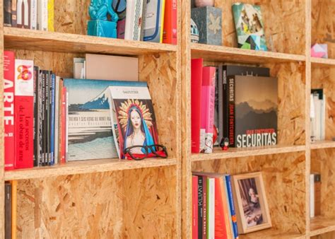 Sliding Chipboard Panels Utilise Space In Madrid Apartment