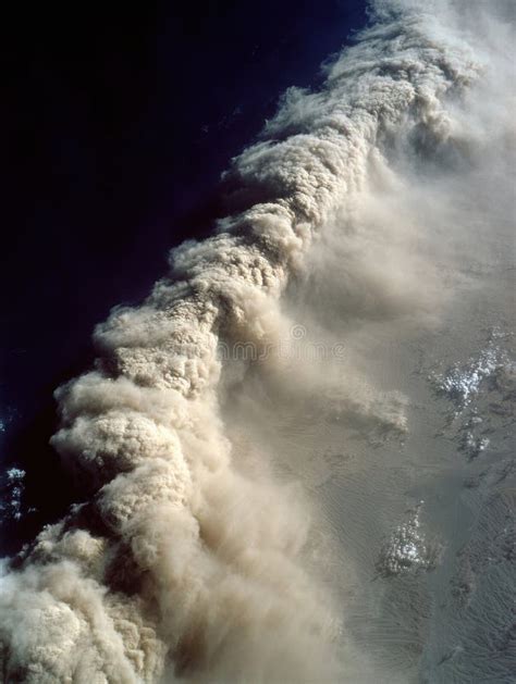 Dust Storm Moves Across The Desert Landscape Capturing The Interplay Of