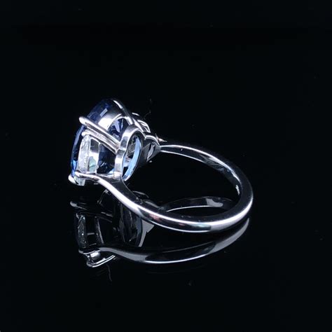 A Platinum 756 Cts Ceylon Sapphire And Half Moon Diamond Ring For Sale