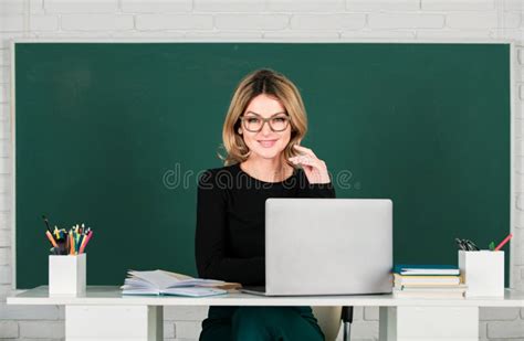 Portrait Of Female Teacher Is Teaching Online Through Webcam Students