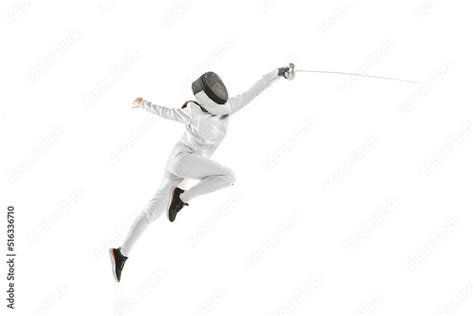 Young Girl Beginner Fencer In Fencing Costume And Mask Practicing With Rapier Isolated On White