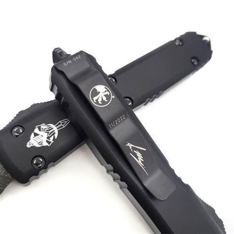 Microtech Ultratech 119 16s Damascus Hellhound Ringed Hardware