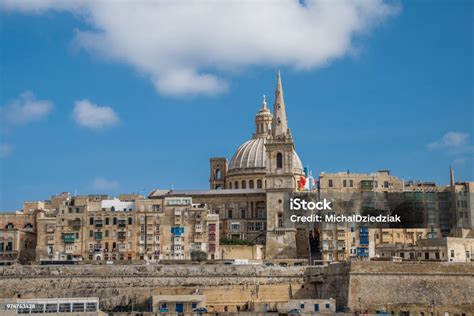 Valletta Malta Skyline Of Capitol City With Blue Sky And Clouds As
