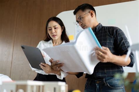 Sustainability And Engineering Team Of Engineers Discussing Eco