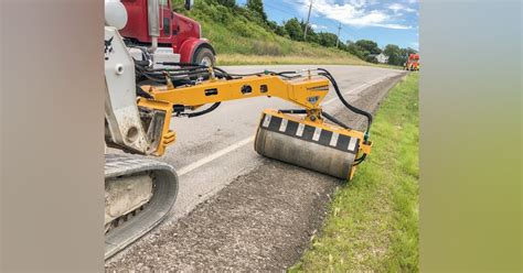 Road Wideners Offset Vibratory Roller Attachment Suppresses Dust