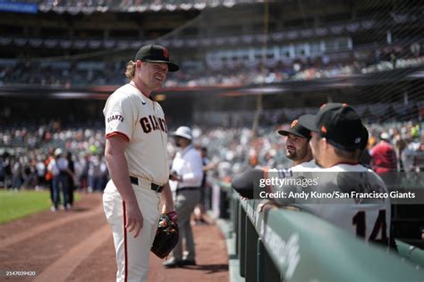 Logan Webb Of The San Francisco Giants Talks To Teammates At Oracle