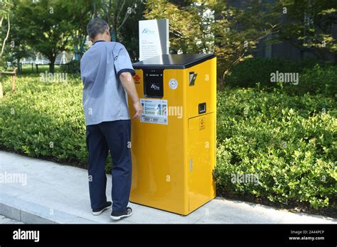 an artificial intelligence ai garbage sorting bin is displayed at