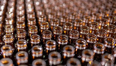 Premium Ai Image Glass Bottle Texture Glass Bottle At Factory For