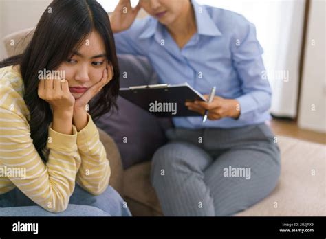 Female Patients Stressful With Mental Problem And Having Session Therapy Talking With
