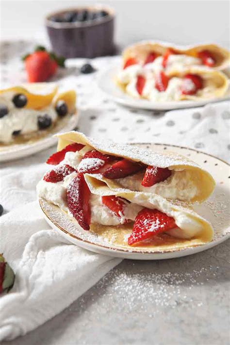 Sweet Breakfast Crepes With Fresh Fruit And Lemon Whipped Cream
