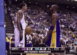 Kobe Bryant Nudging Lebron James 