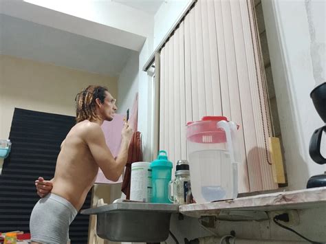 A Mature Man Shaves A Mustache And Beard Without Clothes In The Privacy