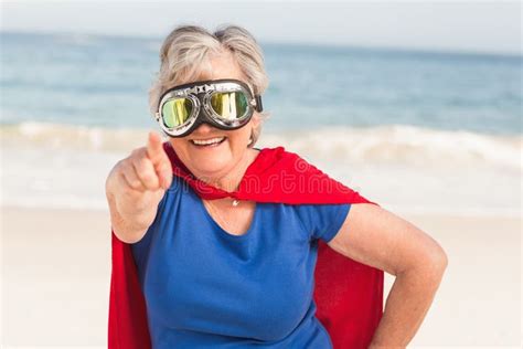 Custume Del Superwoman De La Mujer Que Lleva Mayor Imagen De Archivo