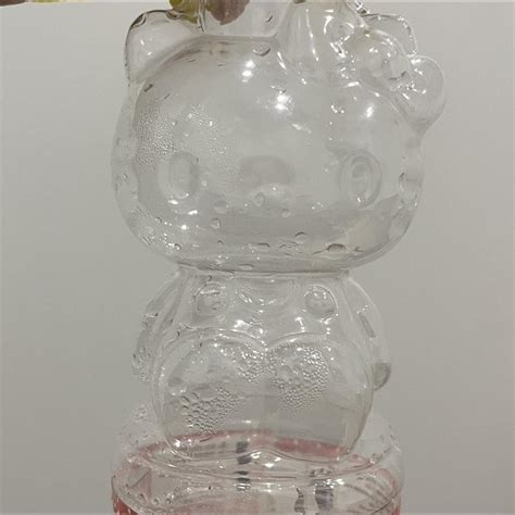 Hello Kitty Shaped Plastic Water Bottle With Yellow Depop