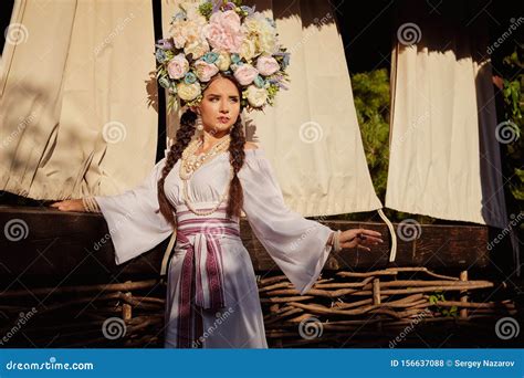 Brunette Girl In A White Ukrainian Authentic National Costume And A