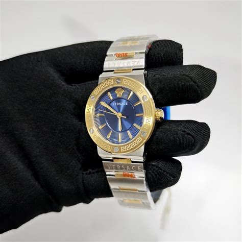 Versace Greca Logo Gold Case Blue Dial Dual Tone Strap Swiss Quartz