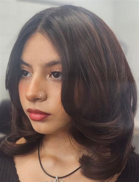 Shoulder Length Haircut With Flipped Layers And Face Framing Shape