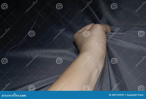 The Hand Squeezes The Sheet With Great Force Passion And Sexuality Are A Hand And A Dark Sheet