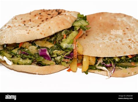 Flat Shami Syrian Bread Filled With French Fries And Green Salad