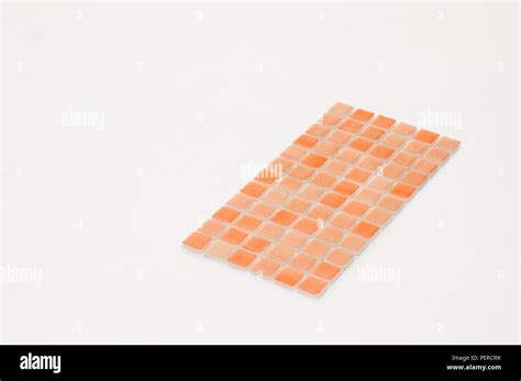 Little Orange Ceramic Tile On A White Background Majolica For The