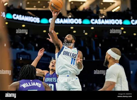 Dallas Mavericks Guard Kyrie Irving 11 Takes A Jump Shot Against The