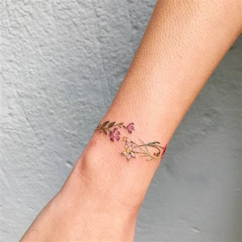 Flowers Wrapped Around Wrist Tattoo At Summer Franklin Blog