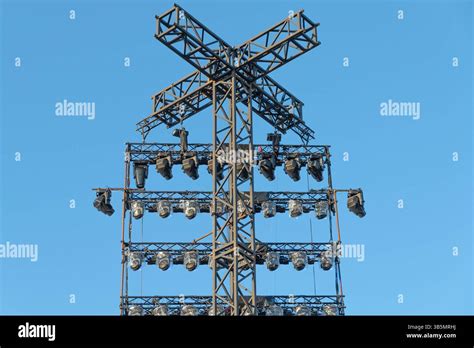Outdoor Concert Lighting Rig With Tower Against Clear Blue Sky Stock