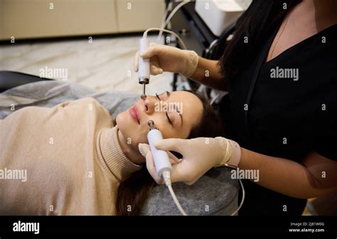 Close Up A Middle Aged Caucasian Pretty Woman Receives Facial