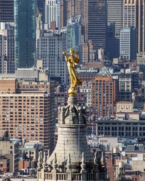 Iconic Gold Statue Atop Manhattan Municipal Building
