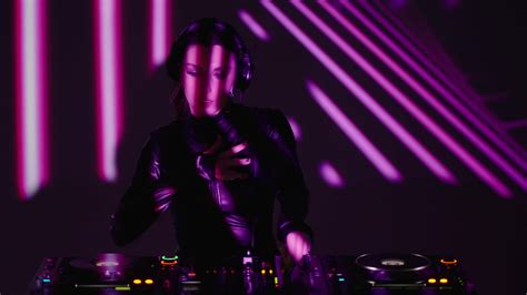 Joyful Lady Dj Dancing In Darkness Mixing Tracks In Nightclub Woman