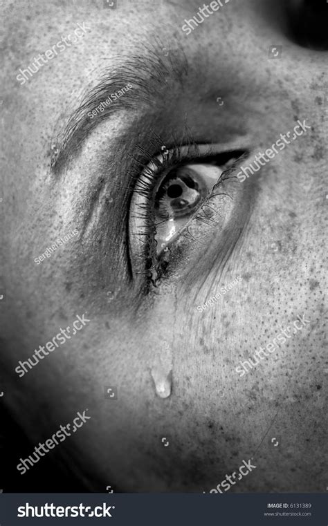 Tear Falling From Eye