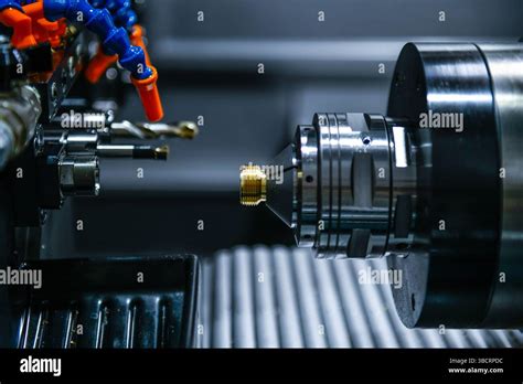 The Cnc Lathe Machine Thread Cutting The Screw Metal Shaft Parts Stock