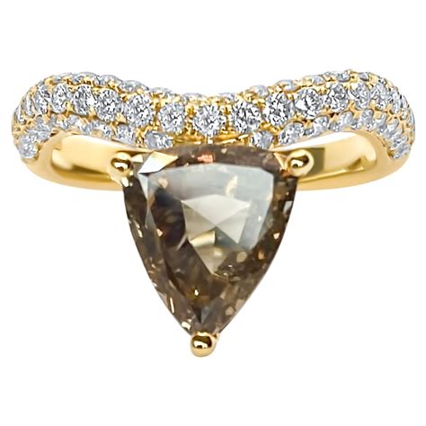 Large Fancy 205 Ct Triangular Diamond Solitaire And Brilliant Cut Dia