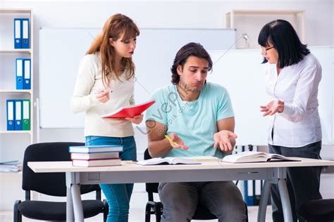 Old Teacher And Students In A Classroom Photo Picture And Hd Photos