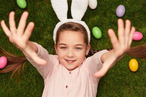 Excited Girl Lying On Grass Near Easter Eggs Stock Image Image Of
