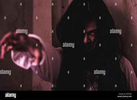 Scary Ghost Woman Asian Ghost Or Zombie Horror Creepy Scary Have Hair Covering Face And Eye