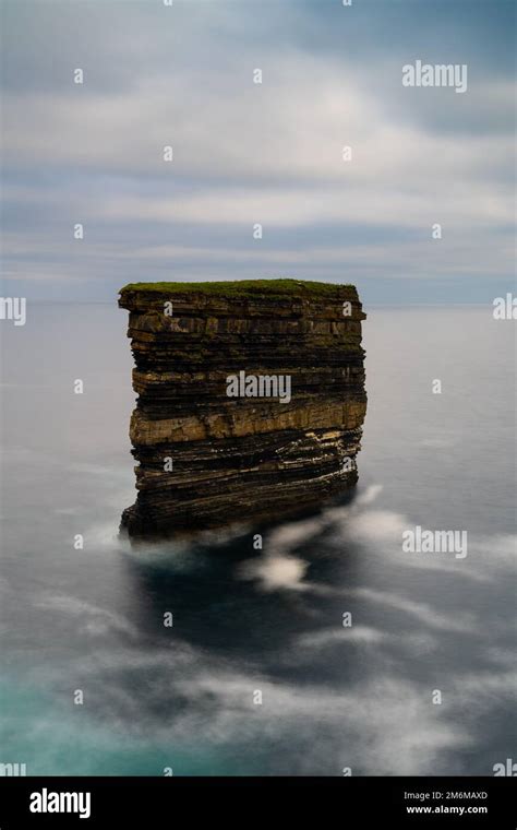 Long Exposure View Of The Landmark Sea Stack Downpatrick Head In County Mayo Of Ireland Stock