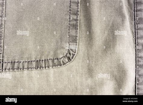 Clothing Items Washed Cotton Fabric Texture With Seams Clasps Buttons