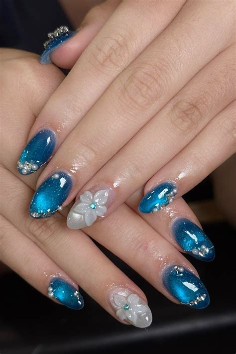 21 Mesmerizing Blue Cat Eye Nails That Will Elevate Your Look Glam