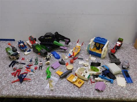 Large Lot Of Assorted Vintage Micronauts Toys Figures Ships Parts And Pieces