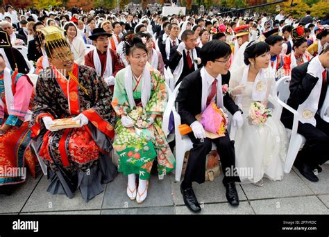 Couples From Around The World Participate In A Mass Wedding Ceremony