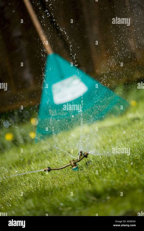 Sprinkler On Lawn Stock Photo Alamy Sprinkler On Lawn Stock Photo Alamy