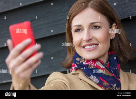 Attractive Successful And Happy Middle Aged Woman Female Taking Selfie