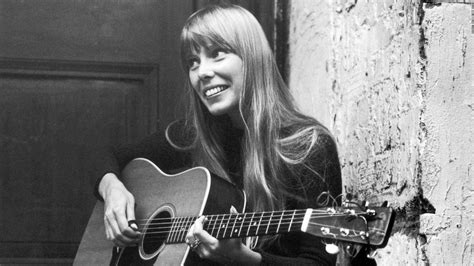 Download Joni Mitchell Playing Guitar Wallpaper