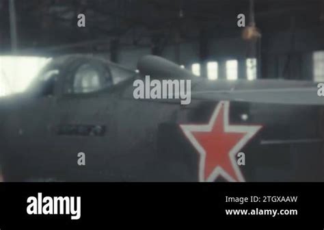 Soviet World War Ii Fighter Planes In Maintenance Inside A Hangar Bell