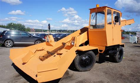 Снегопогрузчик лаповый КО-206