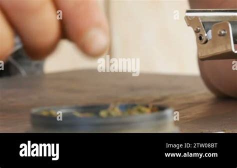 Mens Hands Make Handmade Cigarette Or Roll Ups With Roll Up Machine